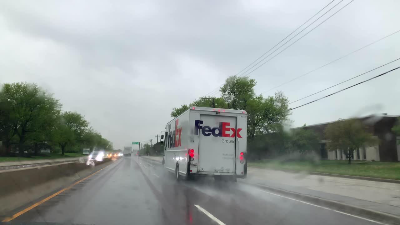FedEx Ground Driving By On A Rainy Road In Motion Free Stock Video ...