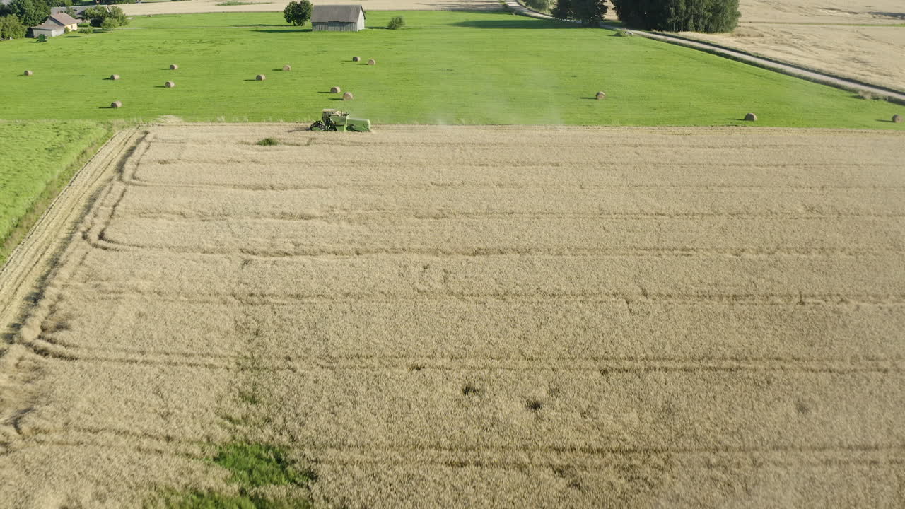 Farmers Using Combine Harvesters To Harvest Rye Grain Crop, Aerial View ...