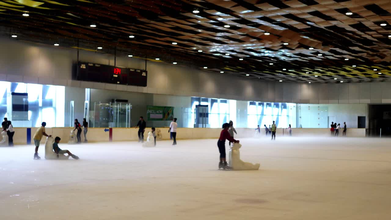 Filipino Families Enjoying The Ice Skating Facilities Within The SM Seaside Mall On South Road ...