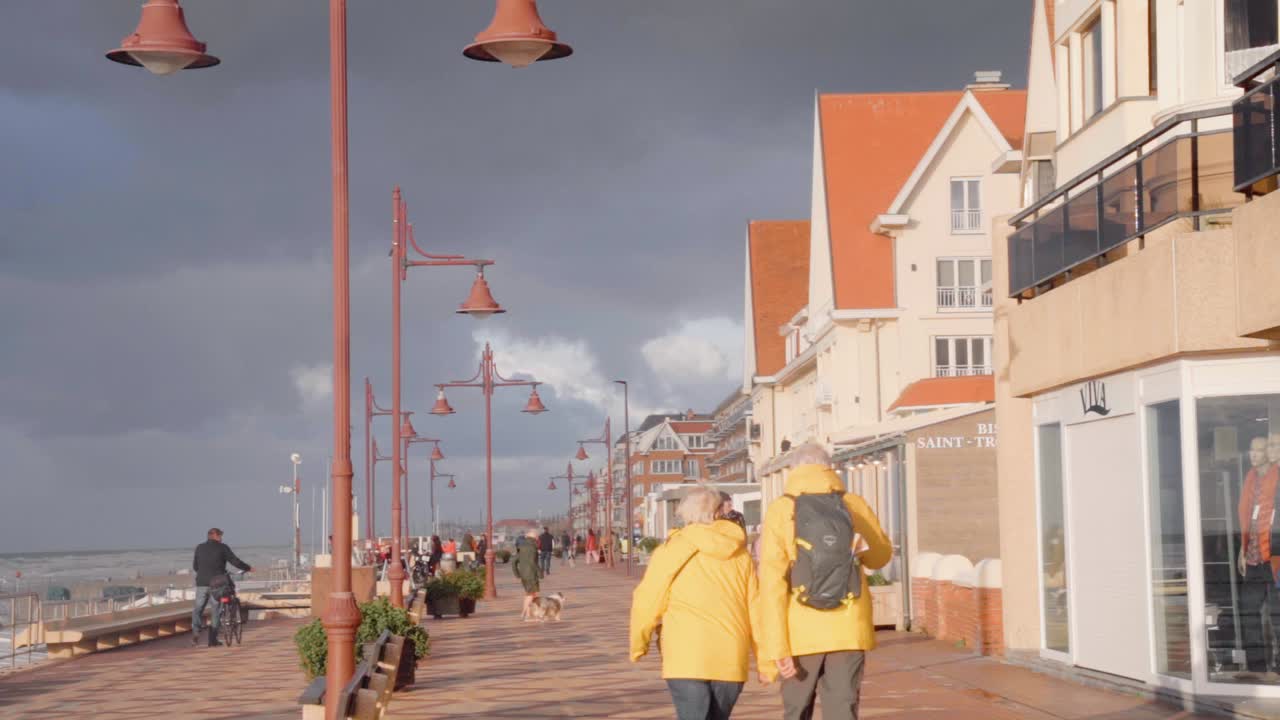 People Walking At Sea Promenade Of De Haan, Belgium Free Stock Video ...