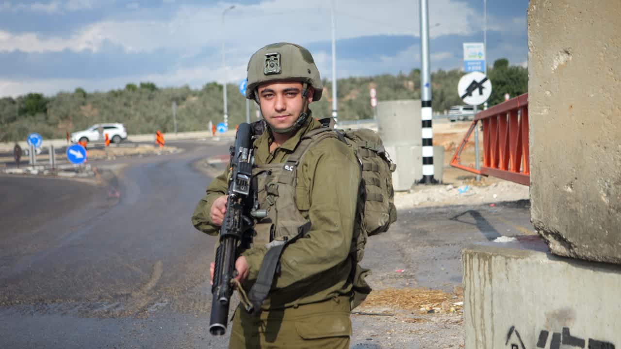 Golani Unit IDF Soldier In Uniform With Machine Gun At Roadblock ...