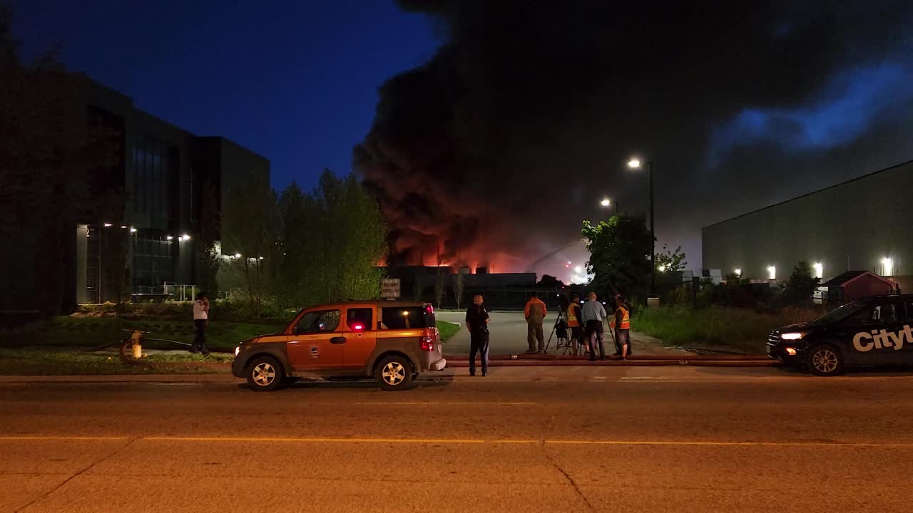 Caustic Chemicals Are Released Into The Air Due To An Industrial Fire ...