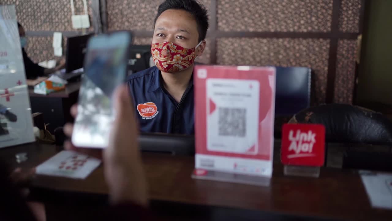Woman Scanning A QR Code With With A Cashier Background, POV Shot Free ...