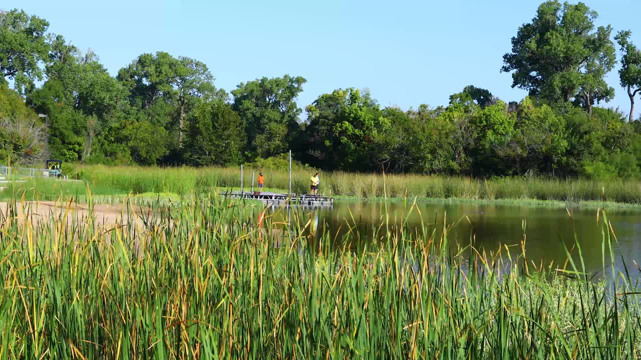 Static Video Of People Fishing On Cedar Lake In Cleburne State Park In ...