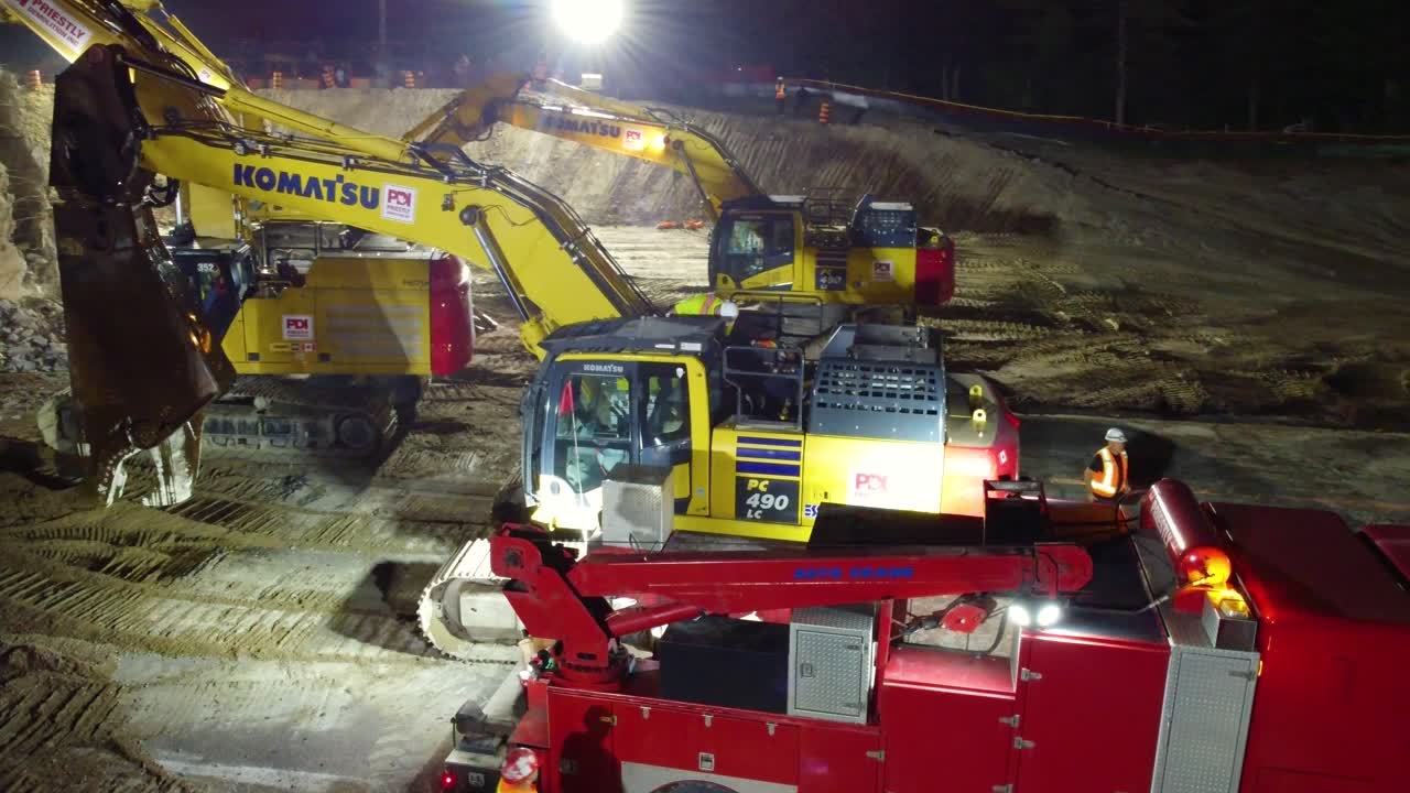 Flyover Demolition Crew Workers Inspecting Excavator As Workers ...
