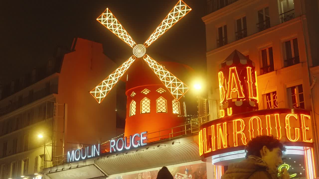 Windmill At Moulin Rouge Is An Iconic And Instantly Recognizable Symbol ...