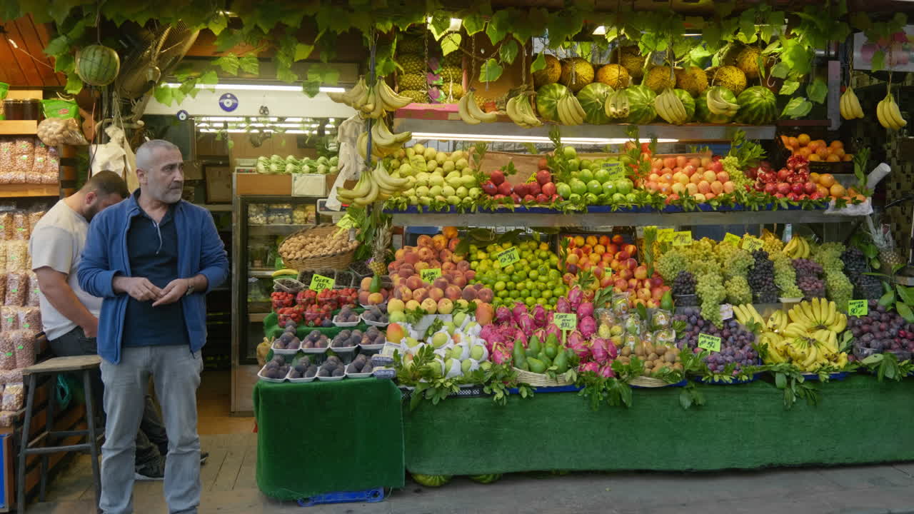 Owner Of Fresh Fruit And Vegetables Stands By His Colourful Market ...