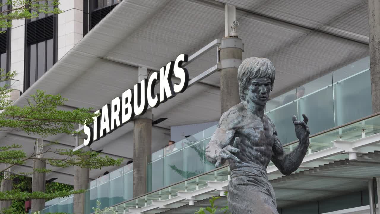 Western Starbucks Cafe Next To Bruce Lee Bronze Memorial Statue At Tsim ...