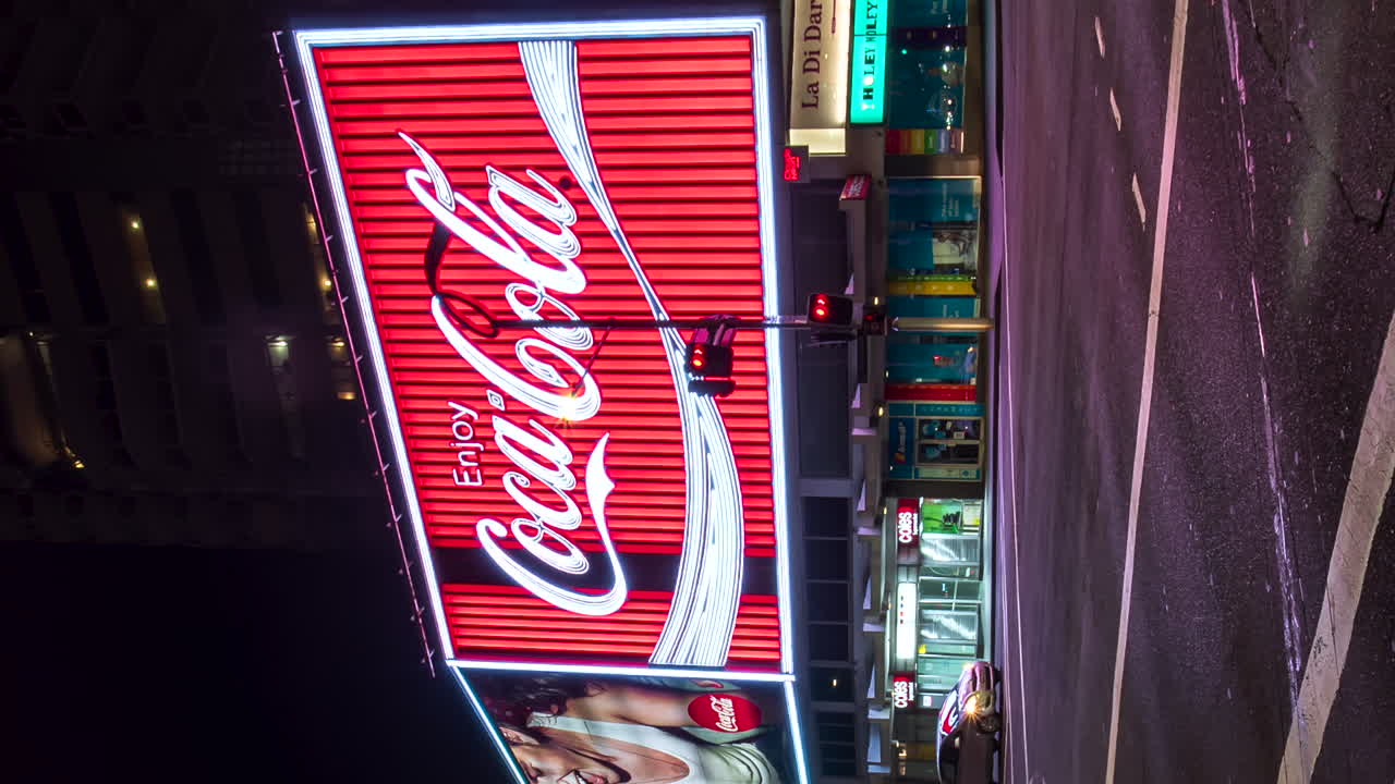 Iconic Coca-Cola Neon Sign In Sydney At Night With Street Traffic ...