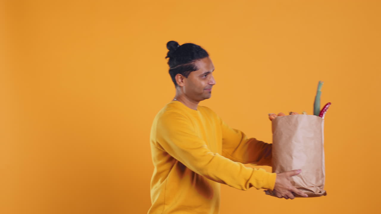 Man Offering Food Order And Digital Payment Method To Client, Studio ...