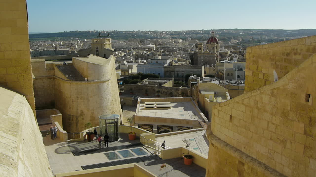 Tourists Wandering At The Aesthetic Fort Of Mediterranean Gozo Island ...
