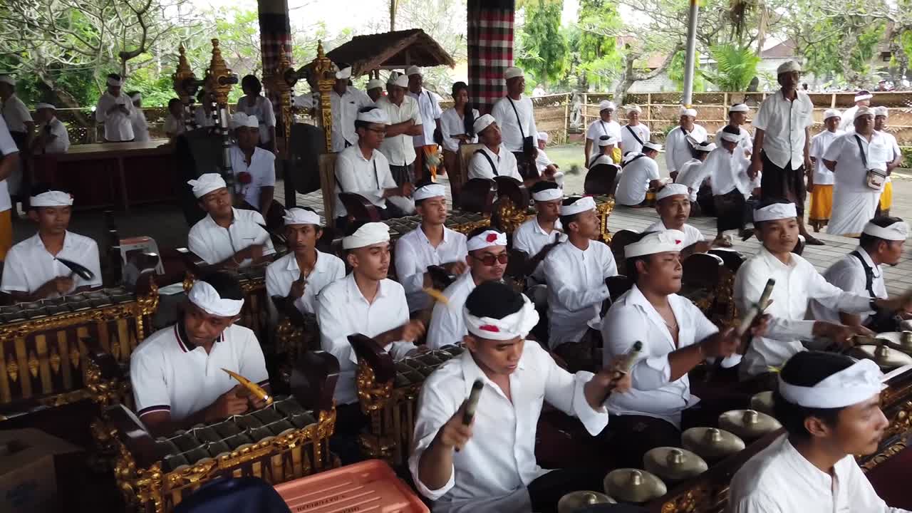 Balinese Musicians Play Gamelan Semar Pegulingan In Hindu Temple ...