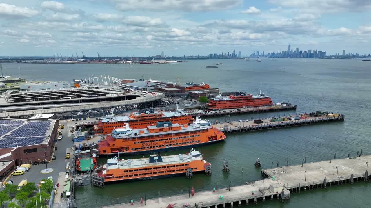 Staten Island Ferry Boats And Terminal With New York City Skyline In ...