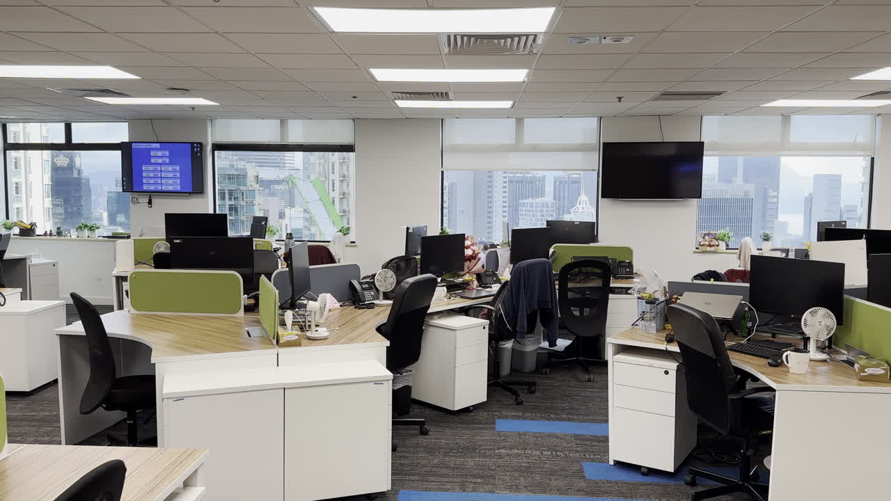 Inside A High-Rise Open Office Overlooking Hong Kong's Skyscrapers Free ...