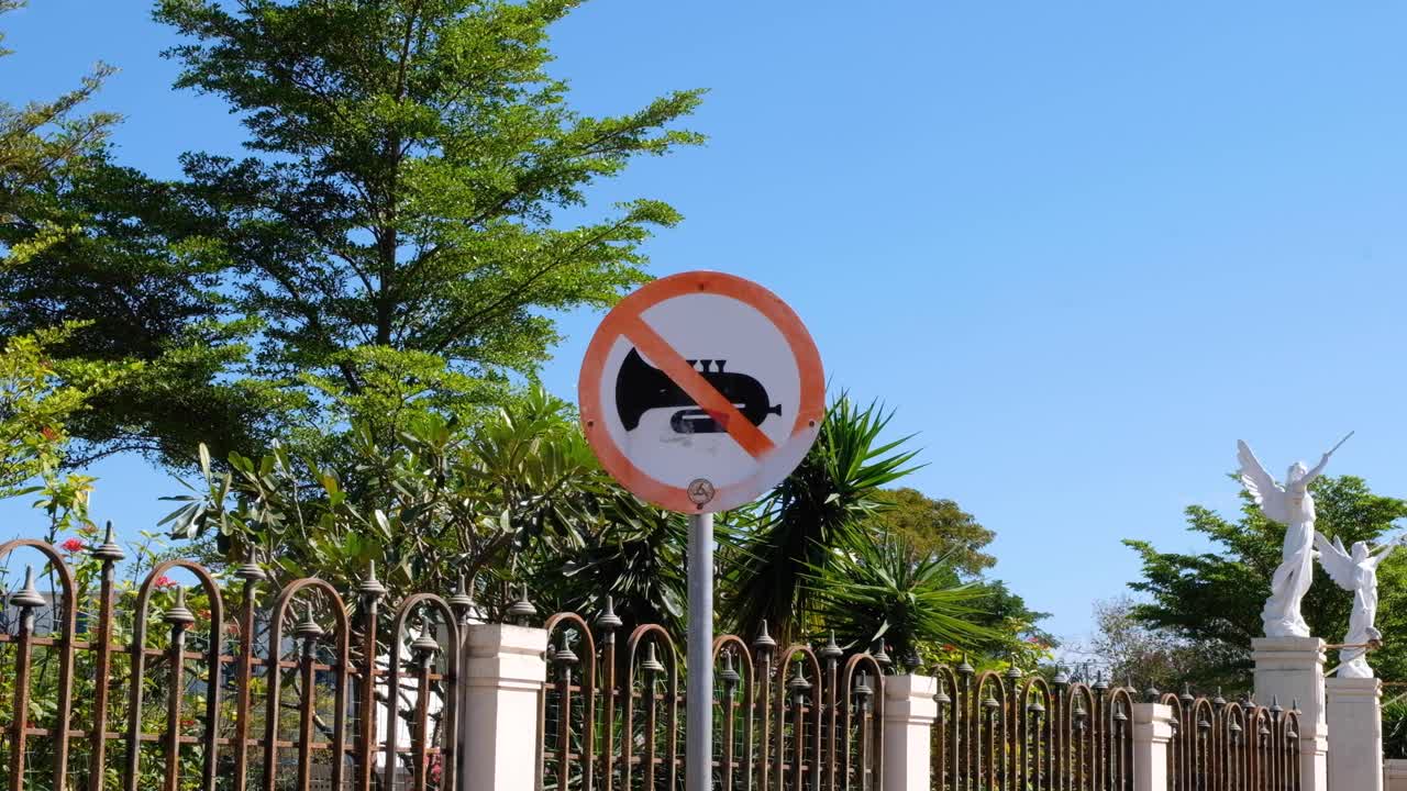 No Music Warning Sign Post For Noise Control Outside A Church In ...