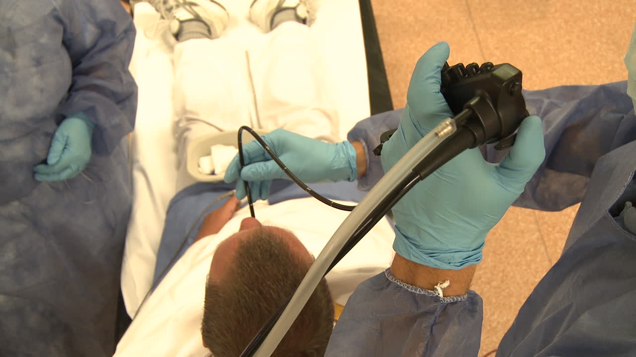 Doctor Performing An Endoscopy Free Stock Video Footage Download Clips ...
