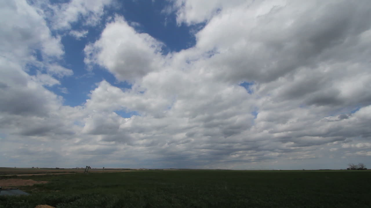Slow Time Lapse Of Moving Clouds Over Plains Free Stock Video Footage ...