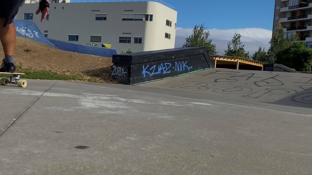 Radical Young Man Skateboarding Doing Some Slide Snaps A Concrete Bowl ...