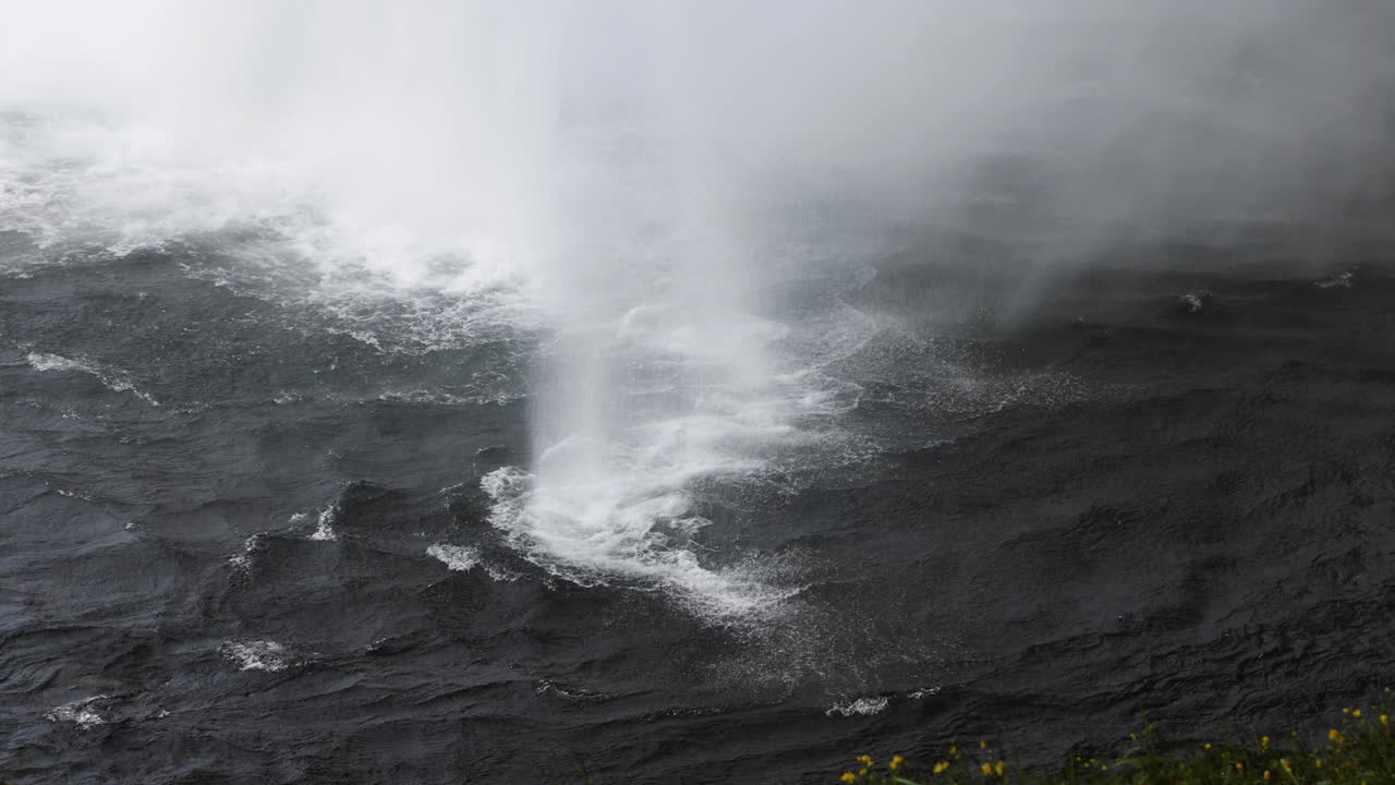 Premium stock video - Water pouring off the seljalandsfoss waterfall ...
