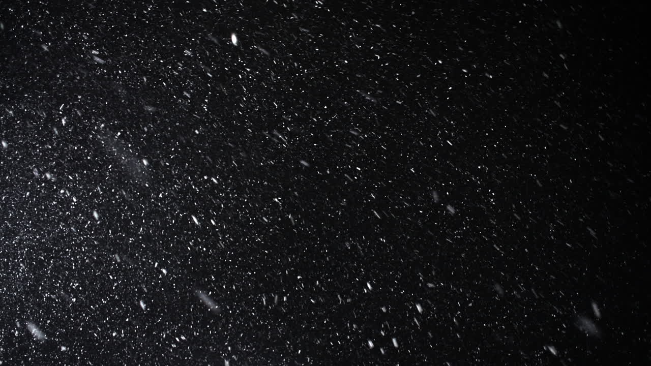 A Dense Blizzard Snowstorm VFX Insert In Slow-motion On Black Screen ...