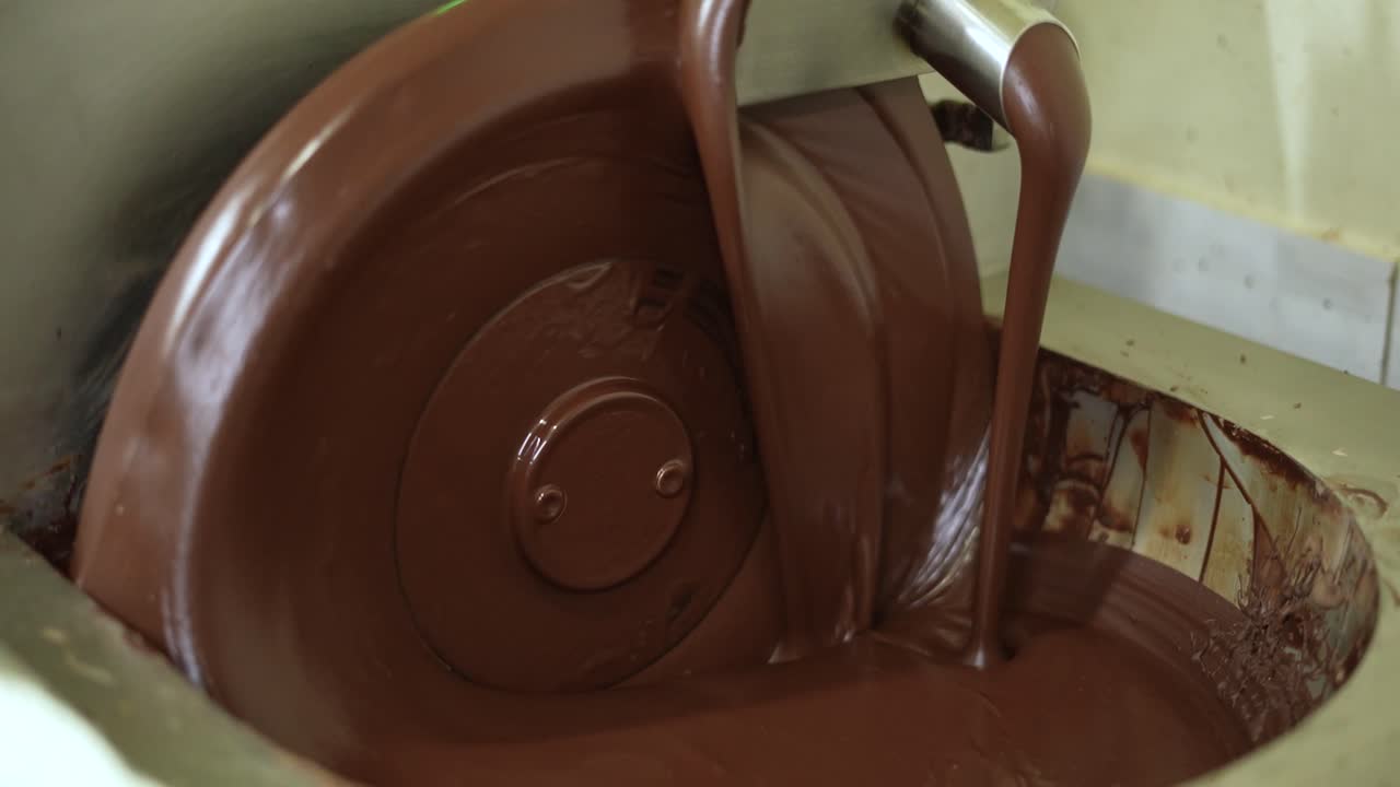 Premium stock video - Melted chocolate handmade chocolate factory cocoa ...