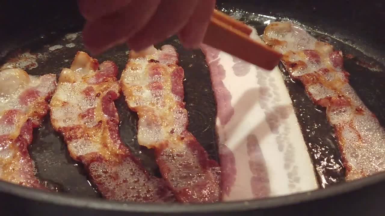 Fatty Piece Of Bacon Being Put On Greasy Pan In Slow-motion Free Stock ...