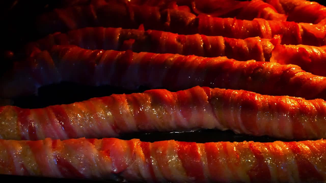 Opening Oven To Reveal Sizzling Extra Long Pigs In Blankets Bacon ...