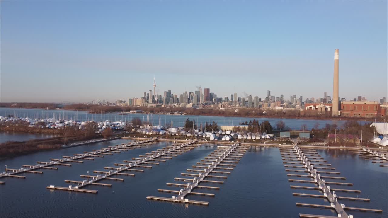 Aerial Flyover Of Boat Harbour, Toronto City Skyline In Background Free ...