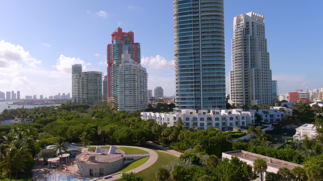 Aerial Rise From Ground Revealing Miami Skyline From Pointe Beach Free ...