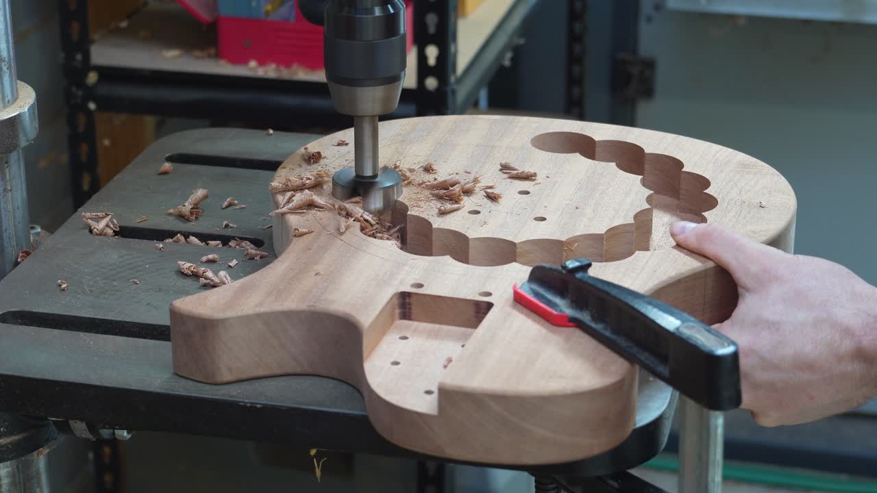 Luthier Drilling Cavity For Resonator In Guitar's Body With Drill Press ...