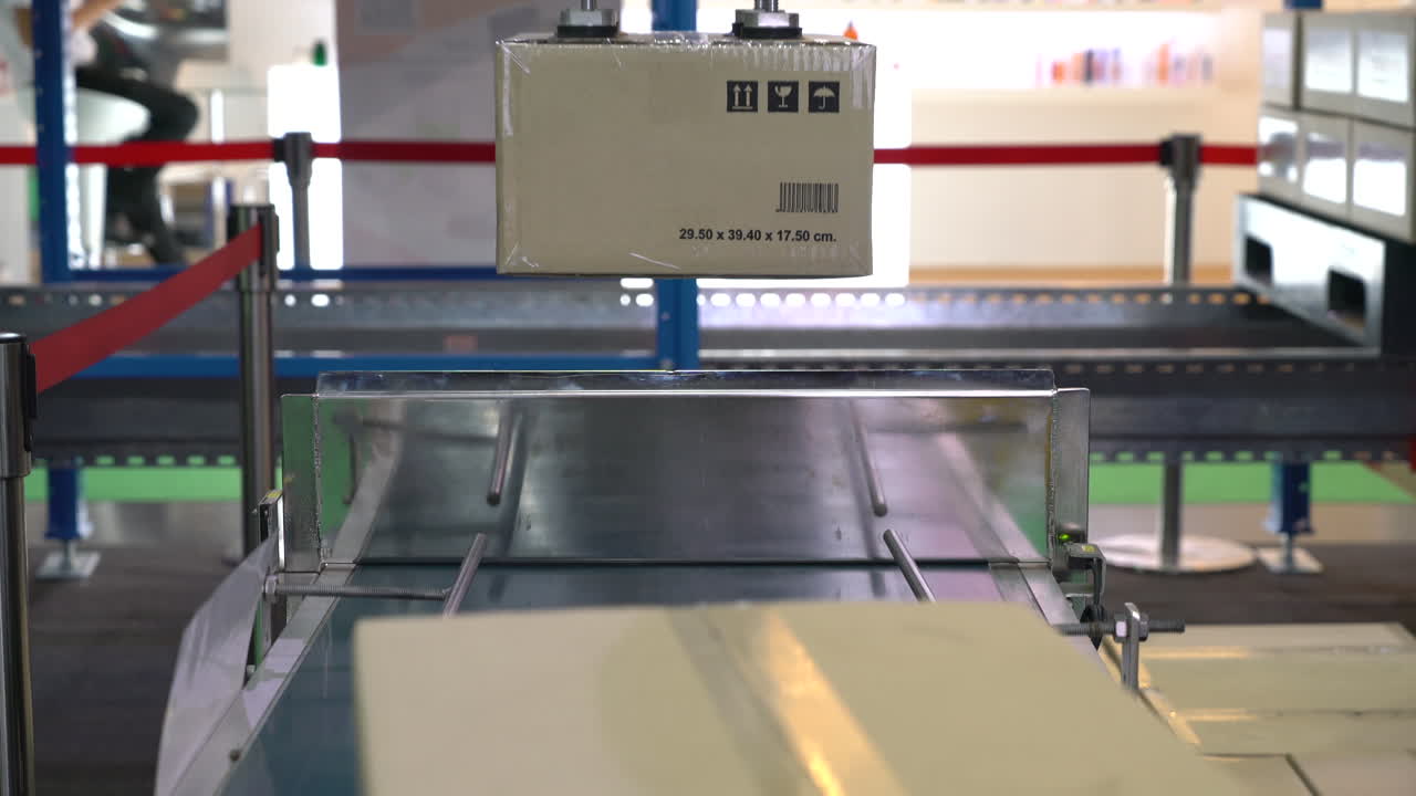 Premium stock video - Moving product package machine working