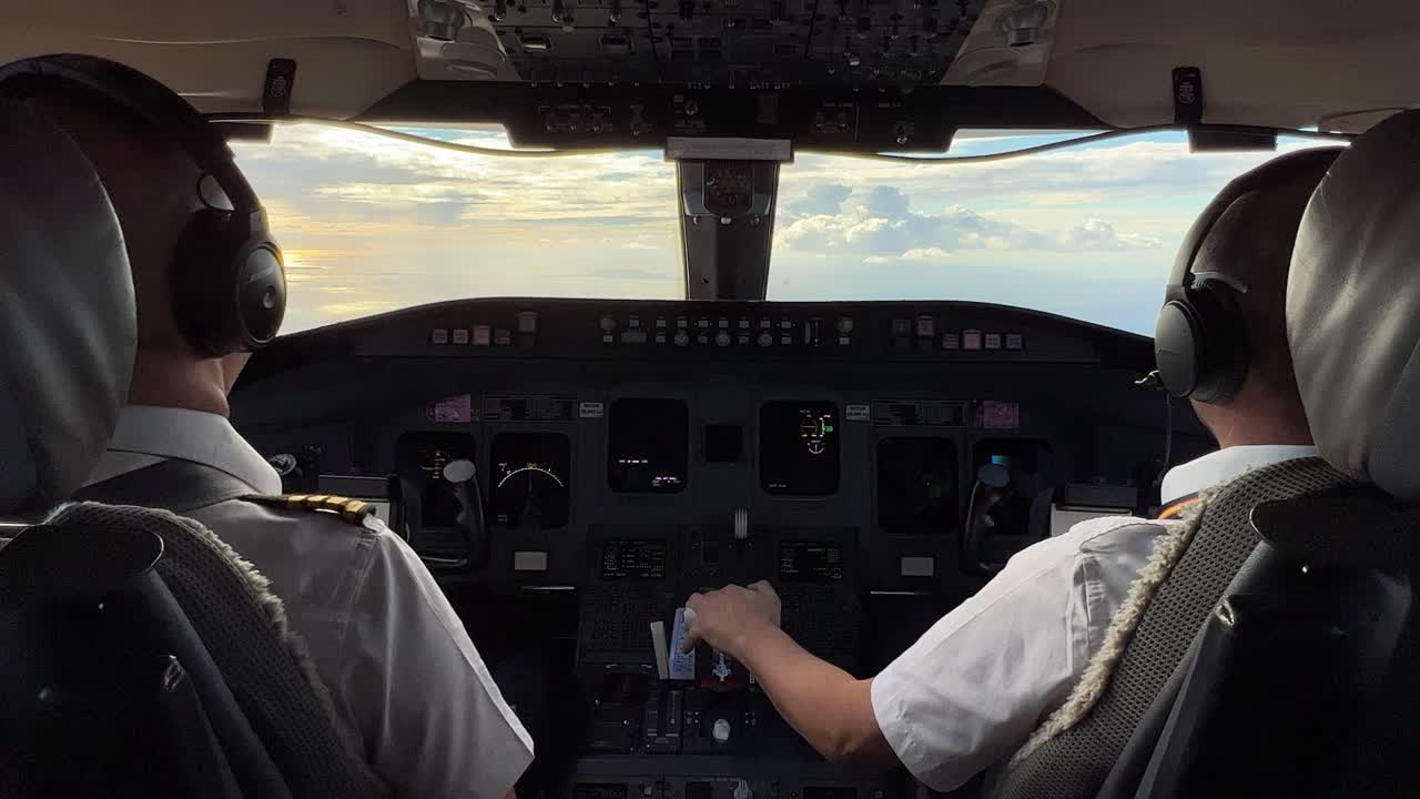 Jet Cockpit View During A Real Flight During Climb At Sunset With Some ...