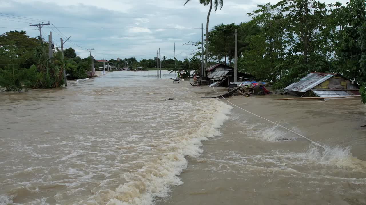 A Typhoon Caused Flood In A Small City Damaging Homes And Crops And ...