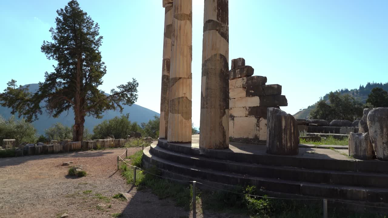 Sun Rays Shining Through Columns Of Tholos Of Delphi Free Stock Video ...