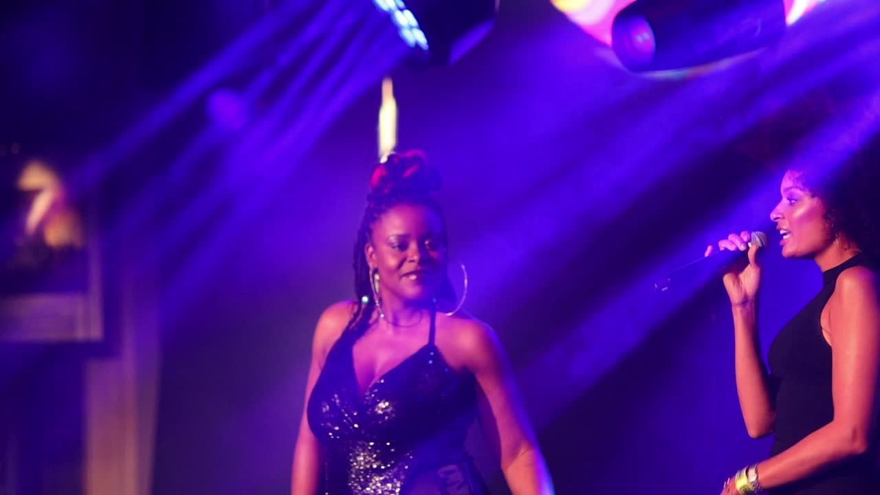 High On Heels Girls With Microphone Singing And Dancing On Musical ...