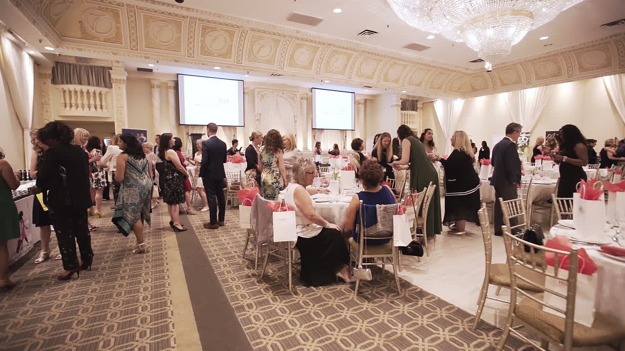Wide Shot Of A Crowded Banquet Hall At An Event Free Stock Video ...
