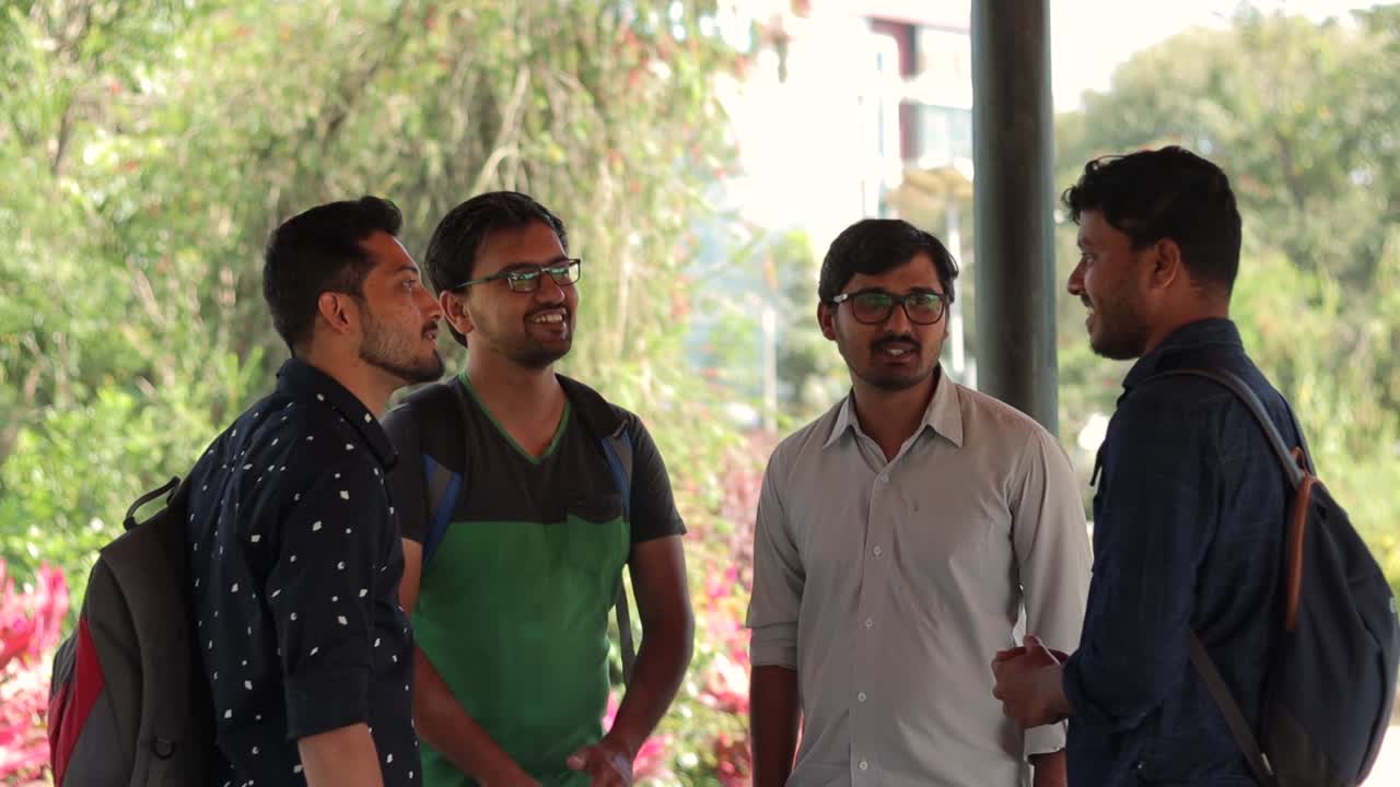 Premium stock video - Young college students socializing - young people ...