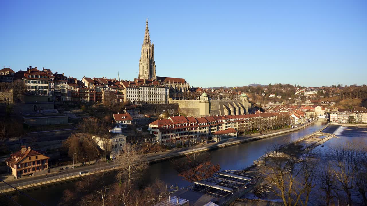 View of the old city of bern with the spire of the gothic minster ...