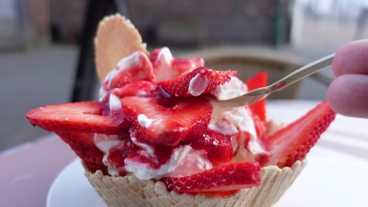 Eating strawberry ice cream close up Premium Stock Video Footage