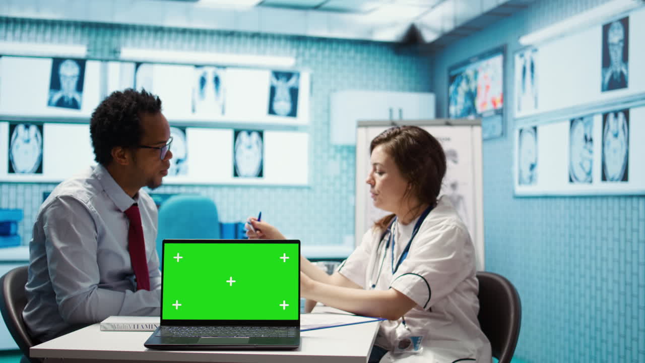 Premium stock video - Doctor meeting with a patient in medical office ...