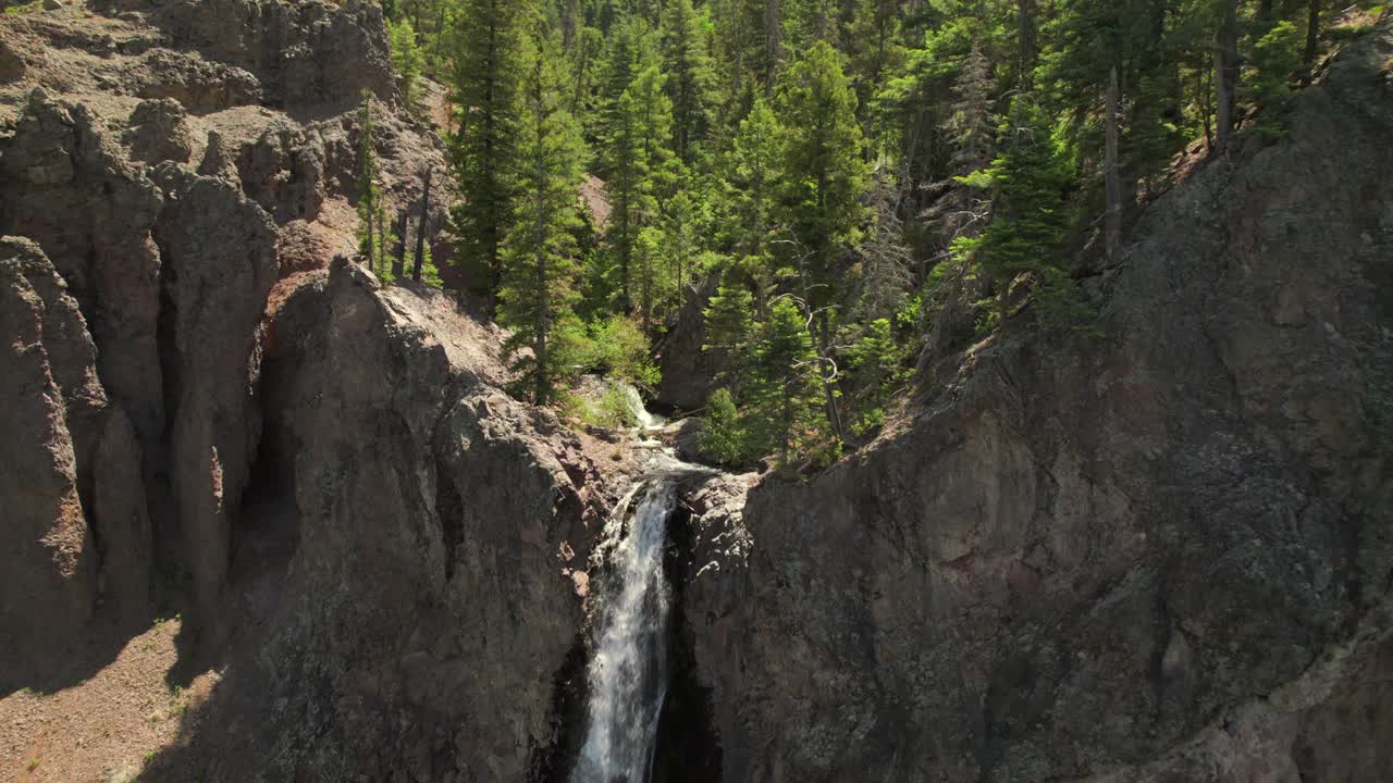 Aerial Reverse Reveal of Treasure Falls Waterfall Near Pagosa Springs ...