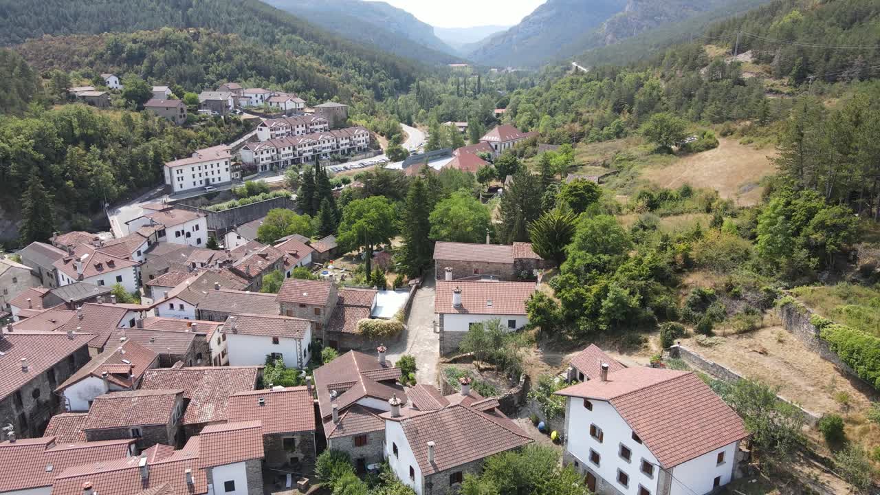 Drone footage above the village in the Roncal Valley in Northern Spain ...
