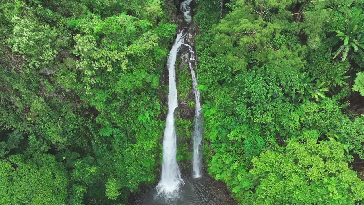 Premium stock video - Ulan waterfall in tropical mountain landscape of ...