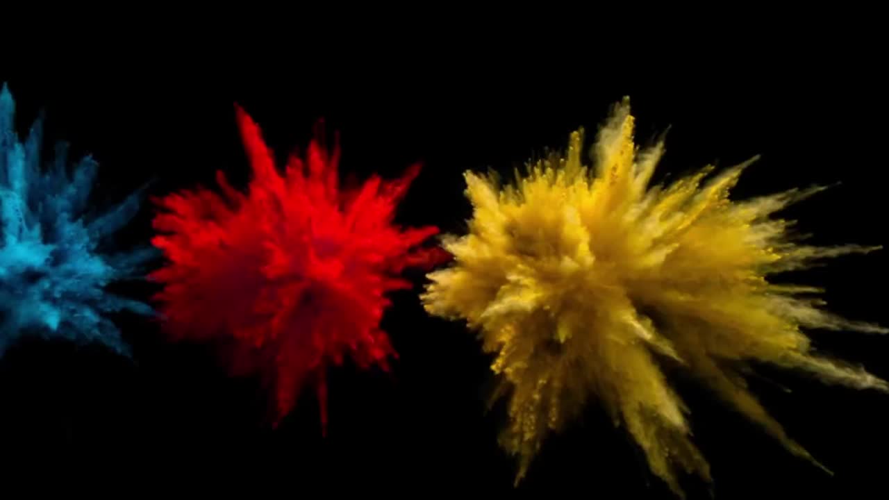 Premium stock video - Closeup view of yellow, blue and red color powder ...