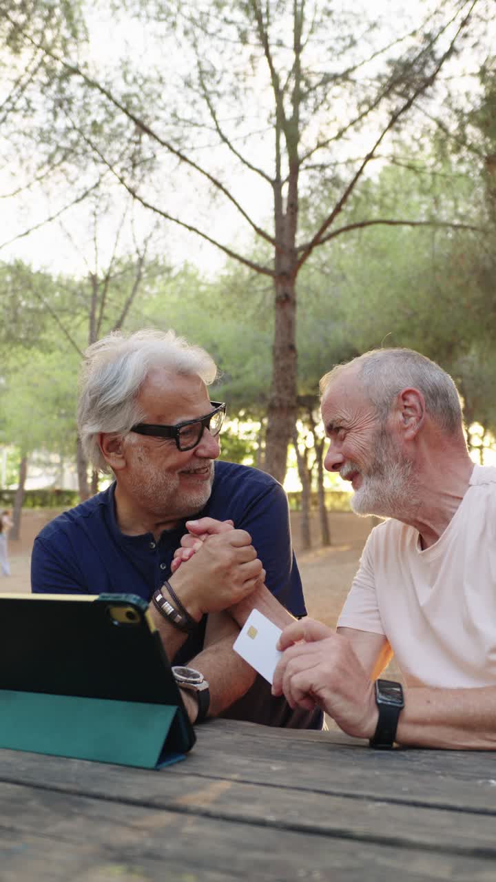 Senior Men Using Technology Outdoors | Premium Stock Video Footage