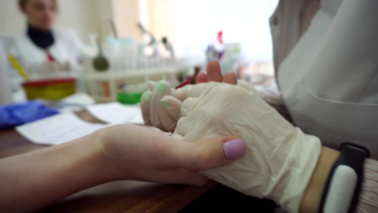 Premium stock video - Closeup view of blood analysis from finger ...