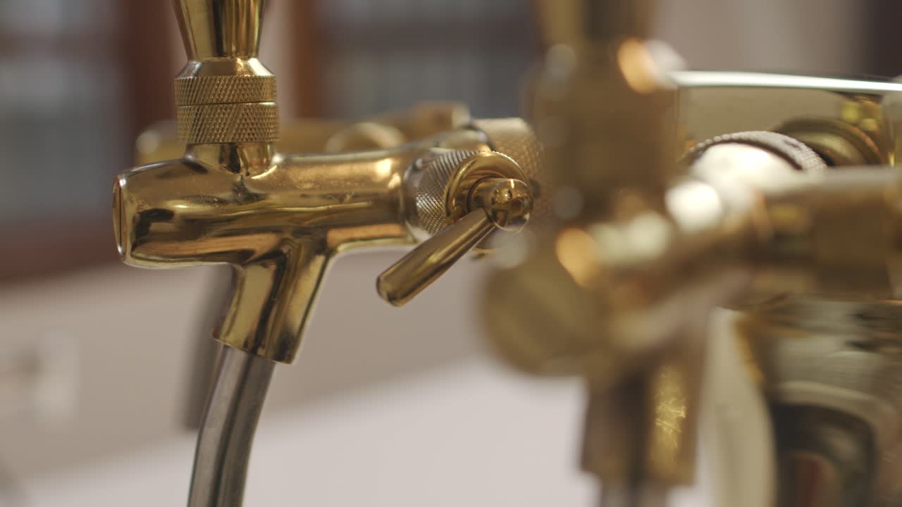 Close up on valves of beer tap tower | Premium Stock Video Footage