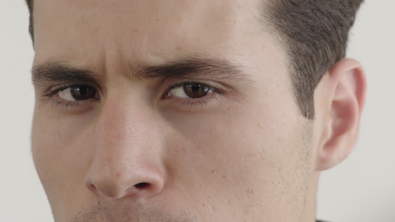 Premium stock video - Close up attractive young hispanic man face ...
