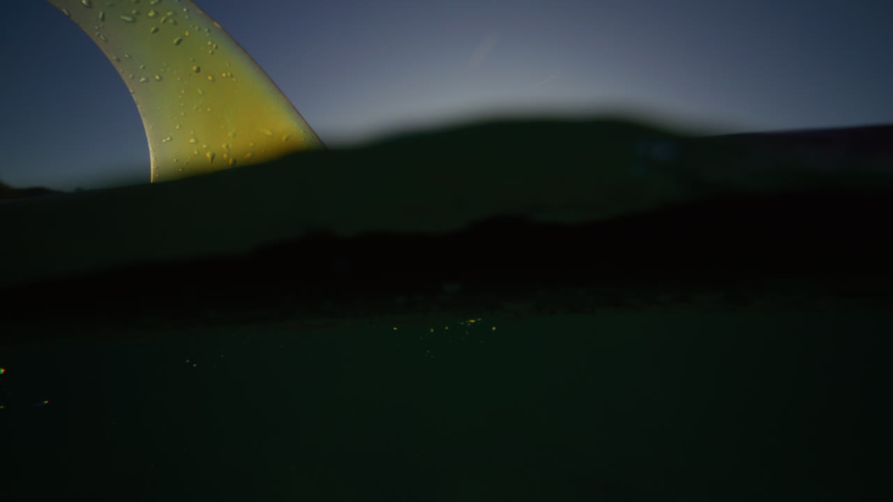 Free stock video - Surfboard single fin sitting on the water in a ...