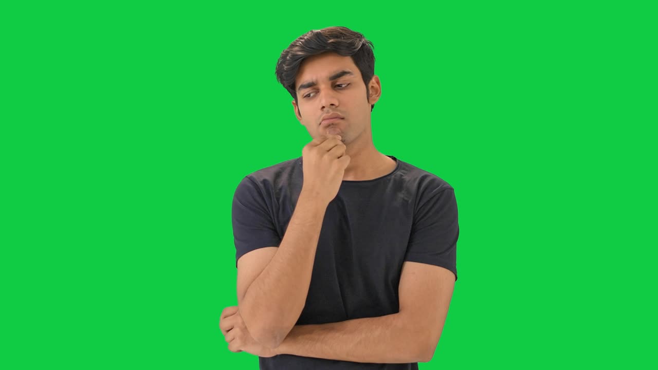 Premium stock video - Indian boy thinking green screen